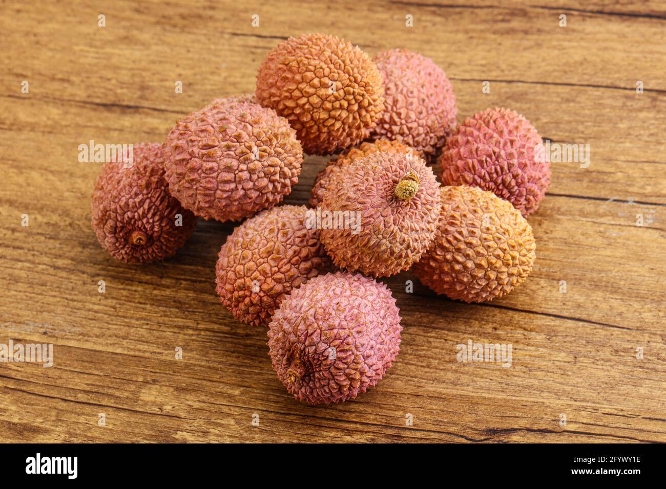 Tropical sweet exotic fruit lychee heap Stock Photo - Alamy