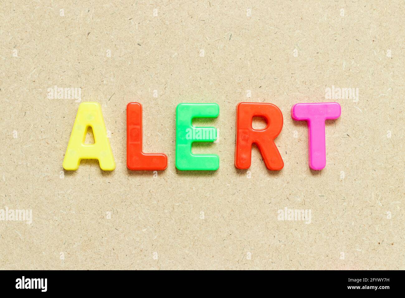 Color alphabet letter with word alert on wood background Stock Photo ...