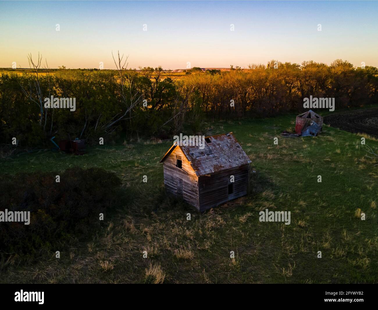Aerial view of old abandoned farm houses that were left to be reclaimed ...