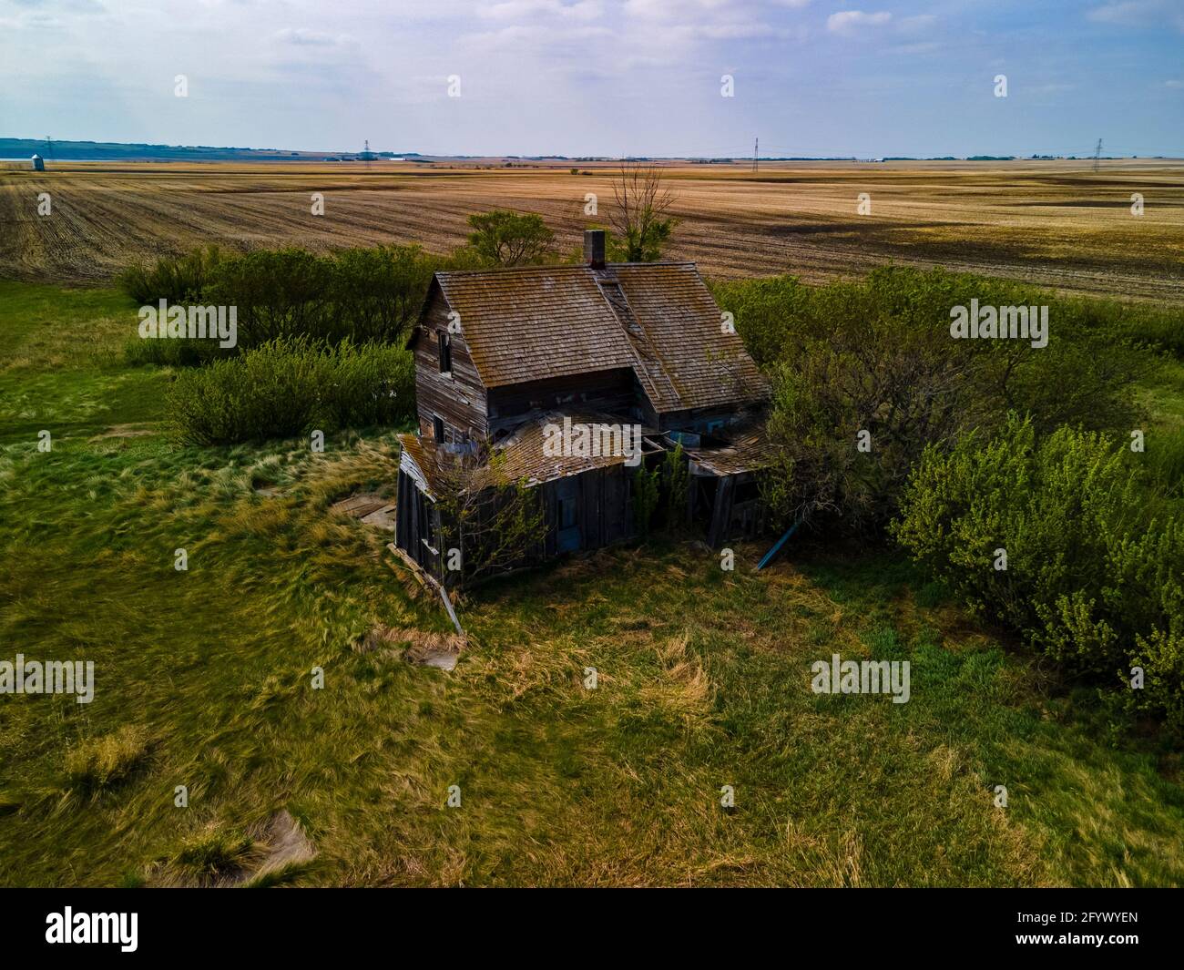 Aerial view of old abandoned farm houses that were left to be reclaimed ...