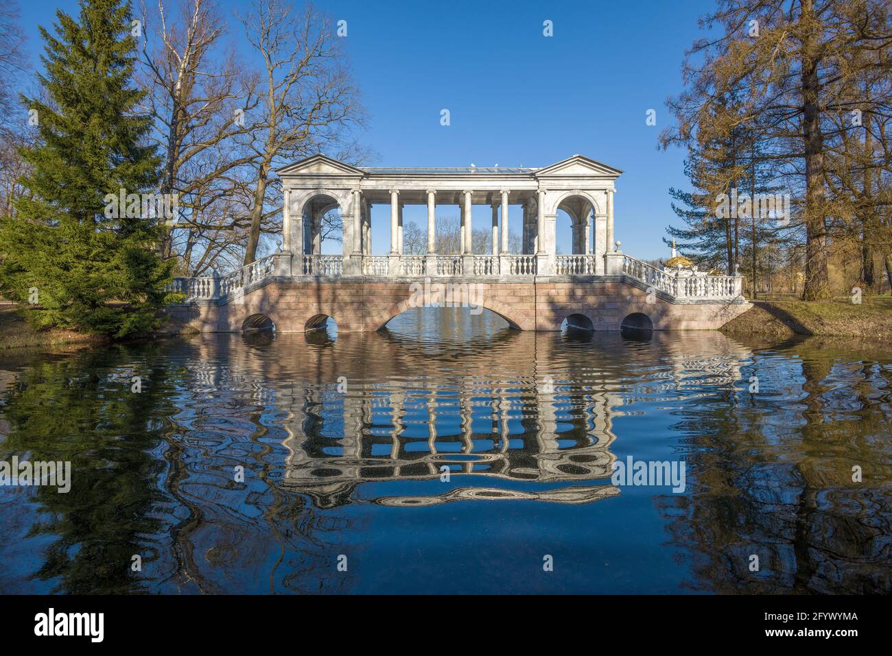 View of the ancient Marble Bridge on a sunny May day. Catherine Park in ...