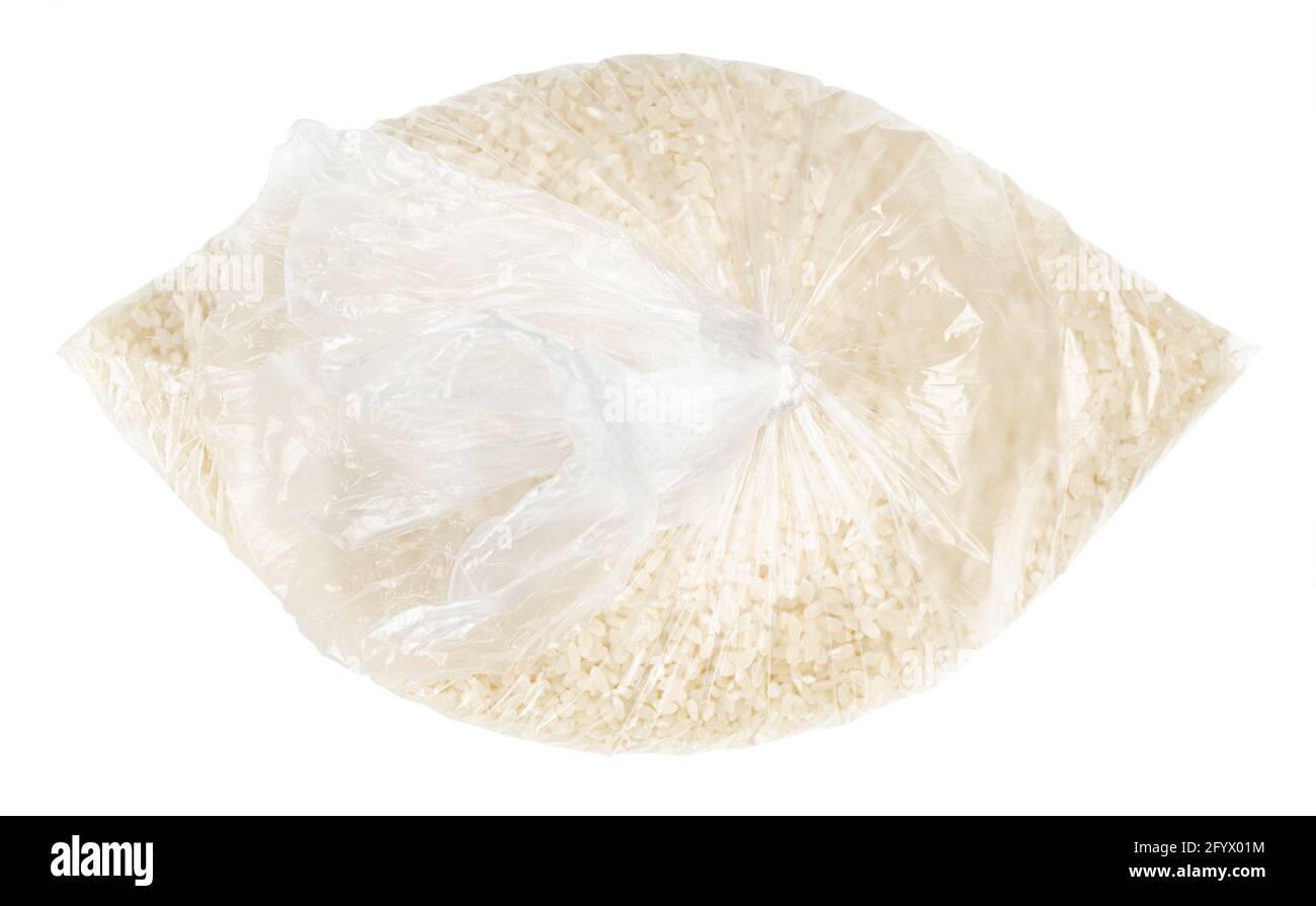 uncooked white rice in tied plastic bag isolated on white background ...