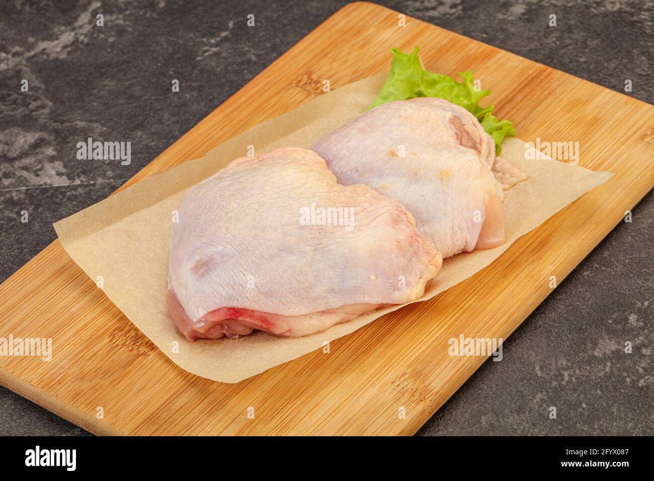 Raw chicken hip ready for cooking Stock Photo - Alamy
