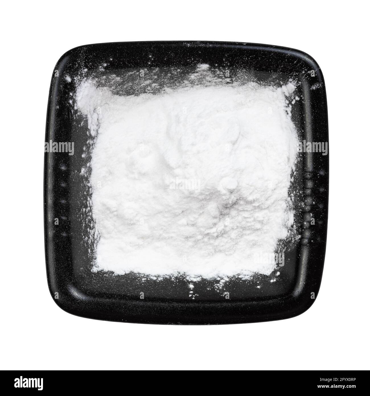 top view of potato starch in black bowl isolated on white background ...