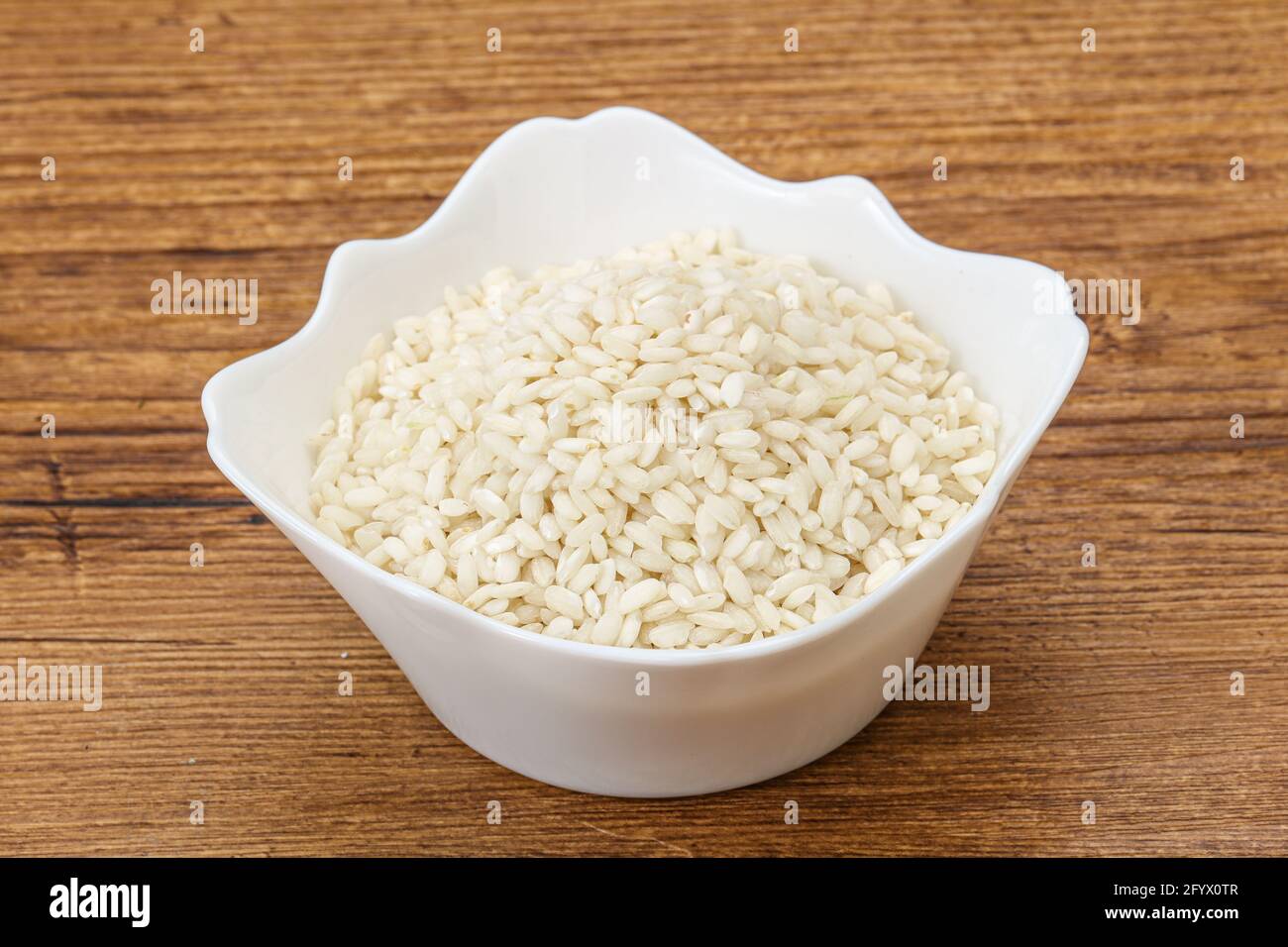 Raw Italian arborio rice for Risotto Stock Photo - Alamy