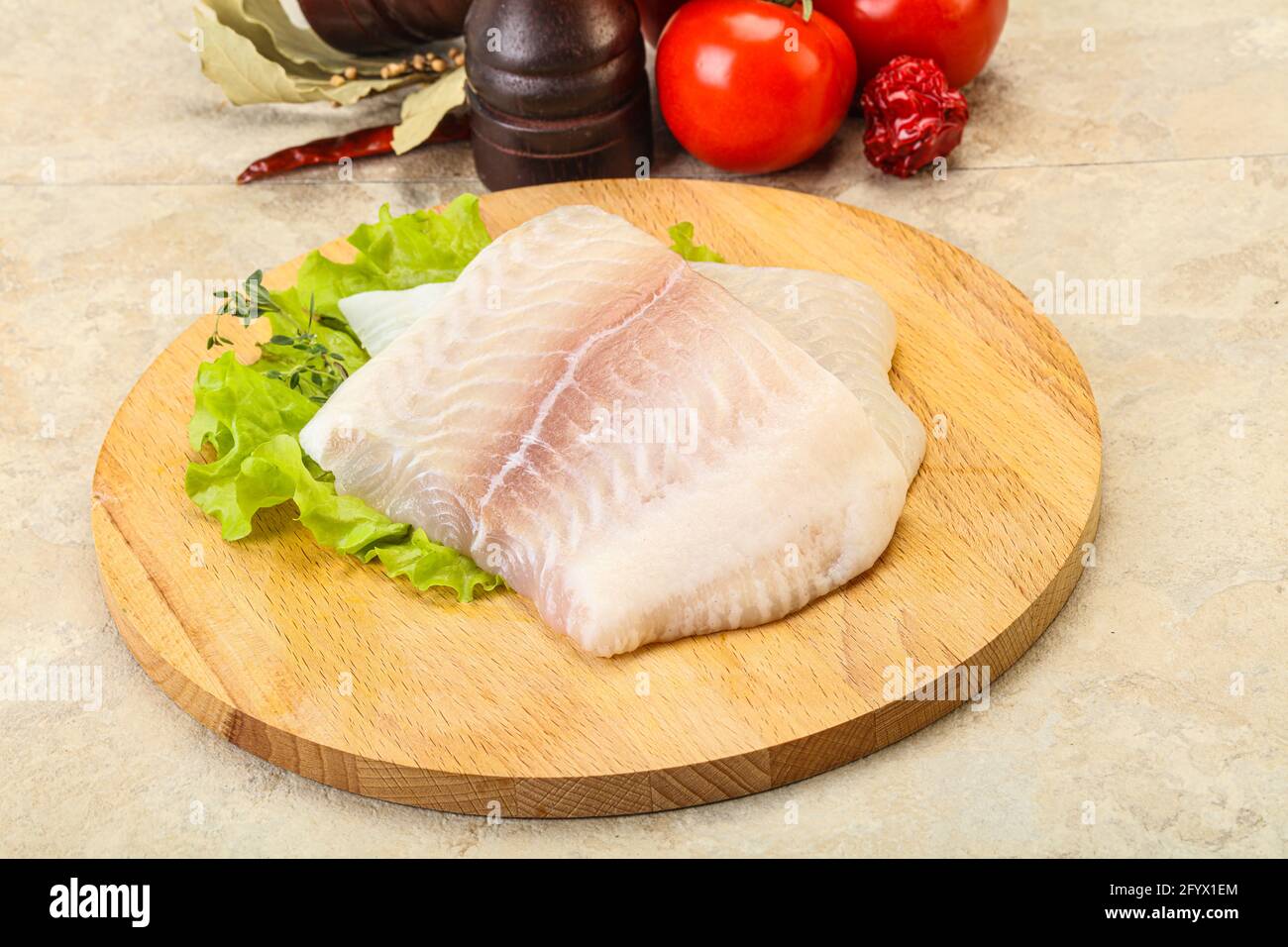 Raw pangasius fillet fish for cooking Stock Photo - Alamy