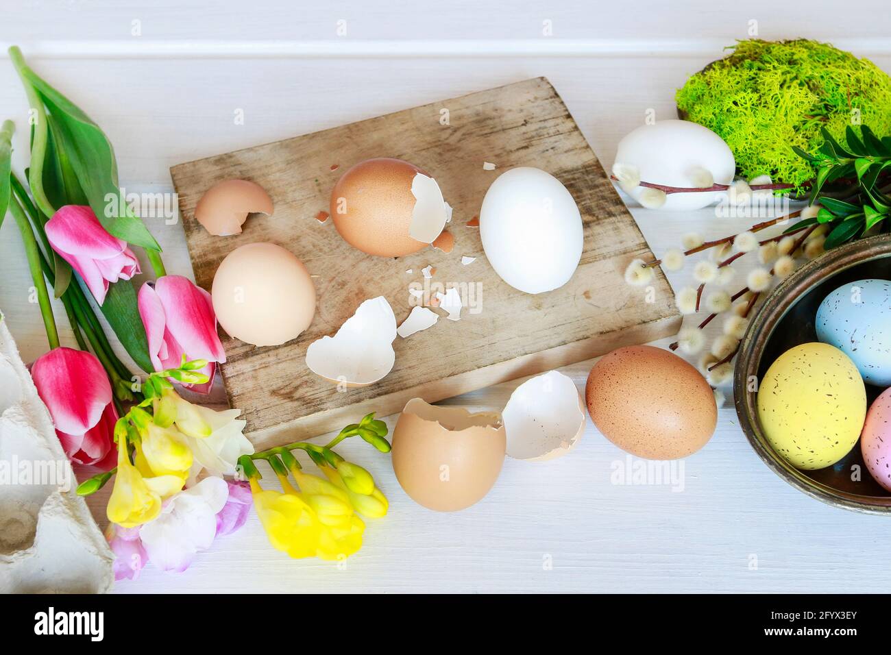 Florist at work: woman shows how to make Easter floral decoration with ...