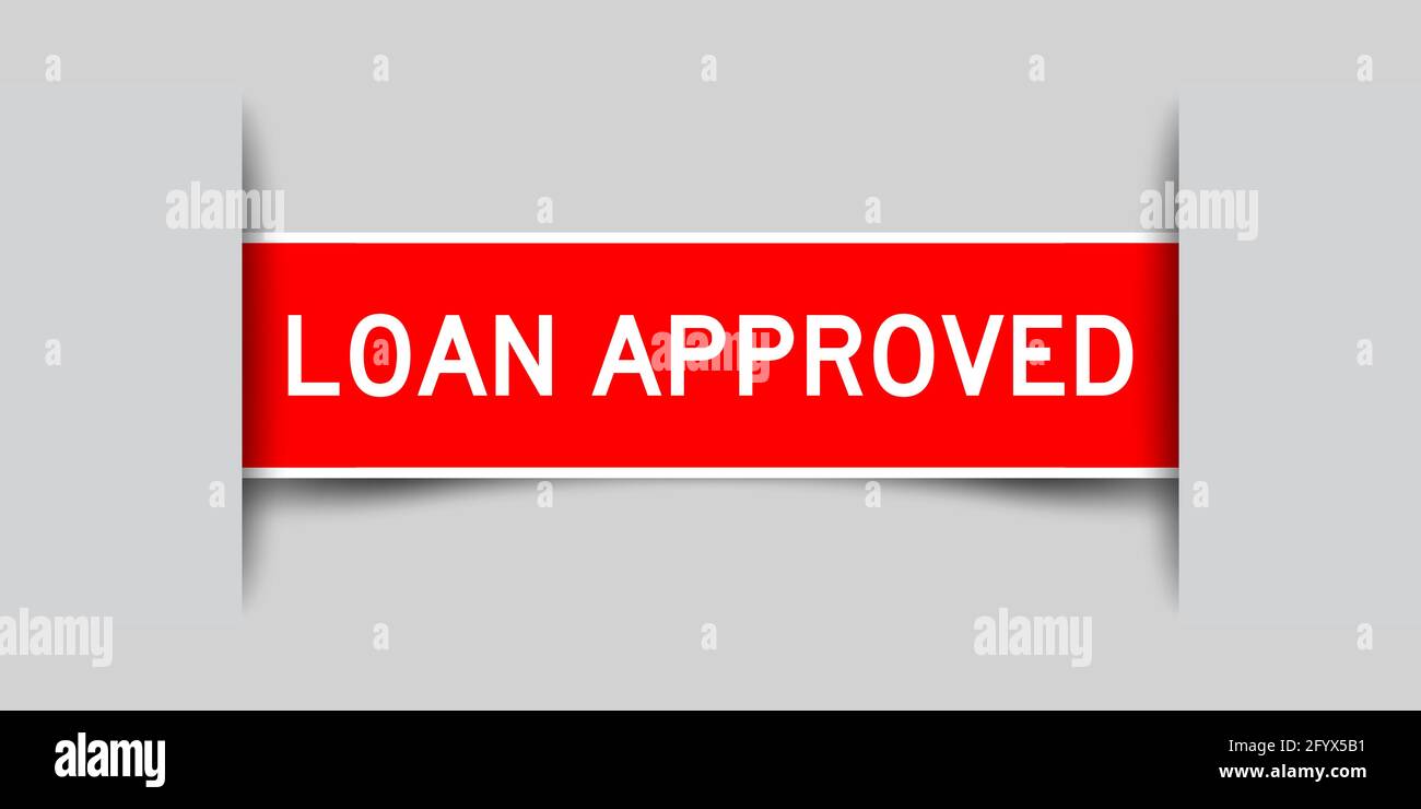 Inserted red color label sticker with word loan approved on gray ...