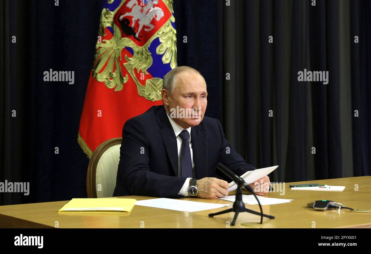 Russian President Vladimir Putin hosts a video conference meeting on ...