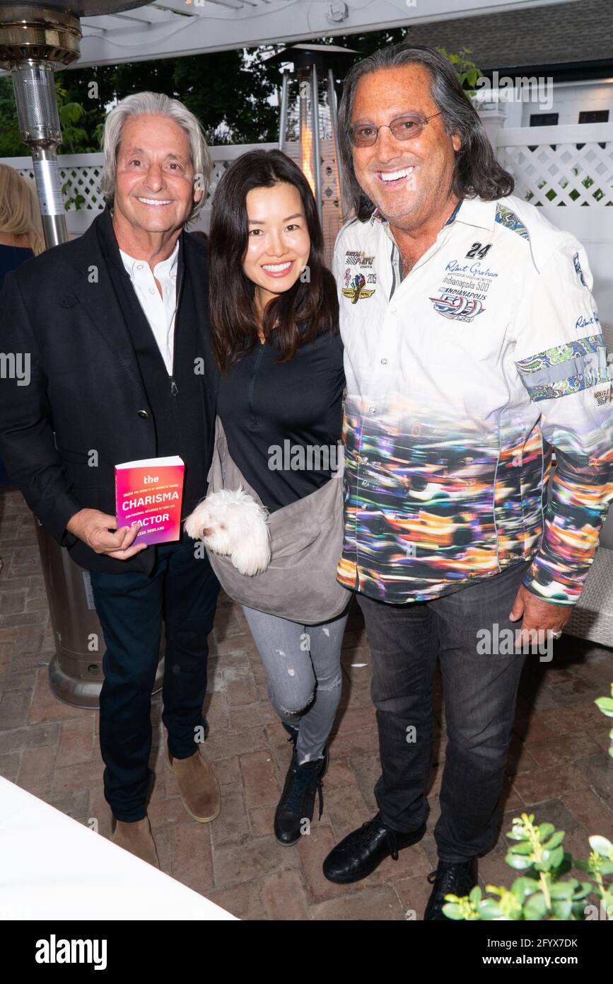 Larry Rosenthal, Julie Kang, Monroe and Larry Wohl attend Leesa Rowland ...