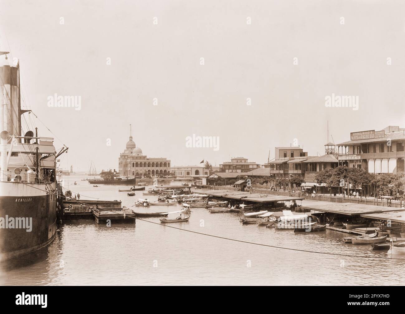 Ship Achillese docked in the Suez Canal at Port Said, Egypt, with ...
