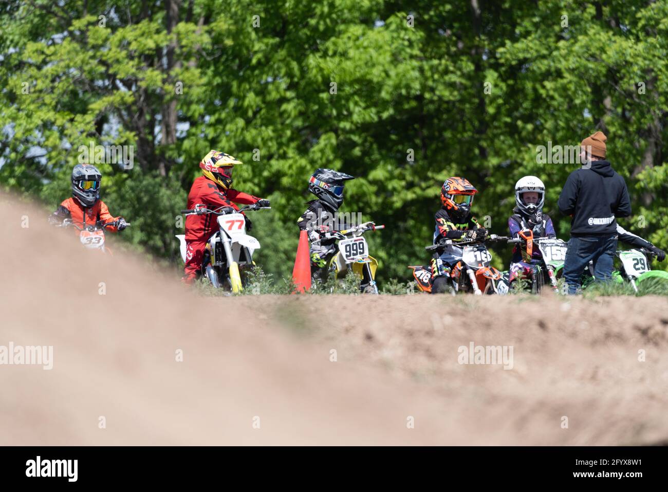 motocross dirt bike practice with kids Stock Photo - Alamy