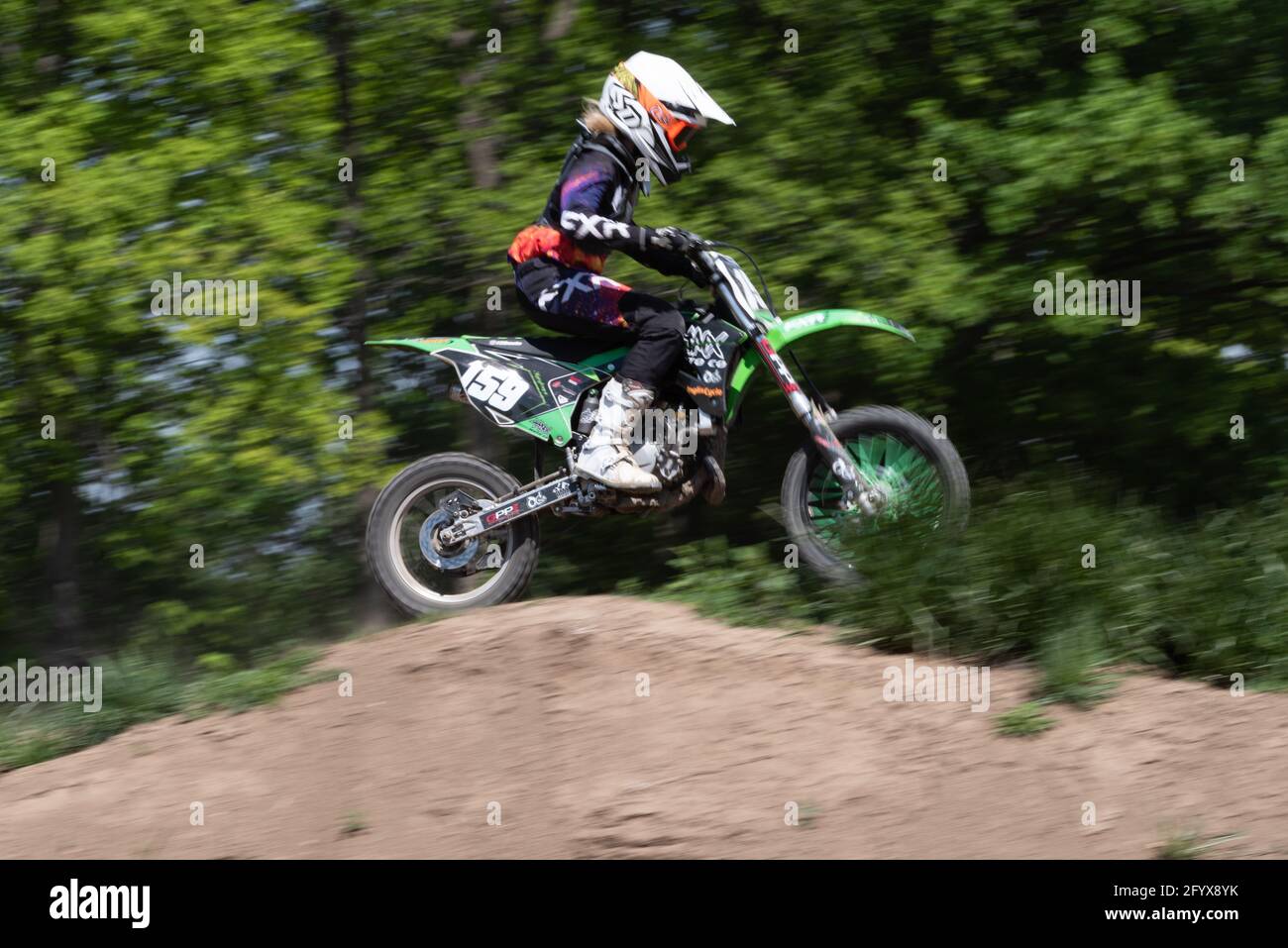 motocross dirt bike practice with kids Stock Photo - Alamy