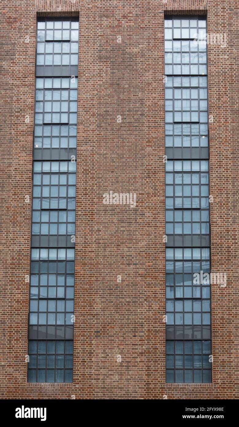 Brick wall with strip windows Stock Photo - Alamy