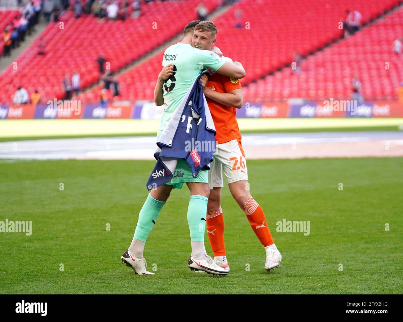 Blackpool goalkeeper Stuart Moore (left) and Daniel Ballard celebrate ...