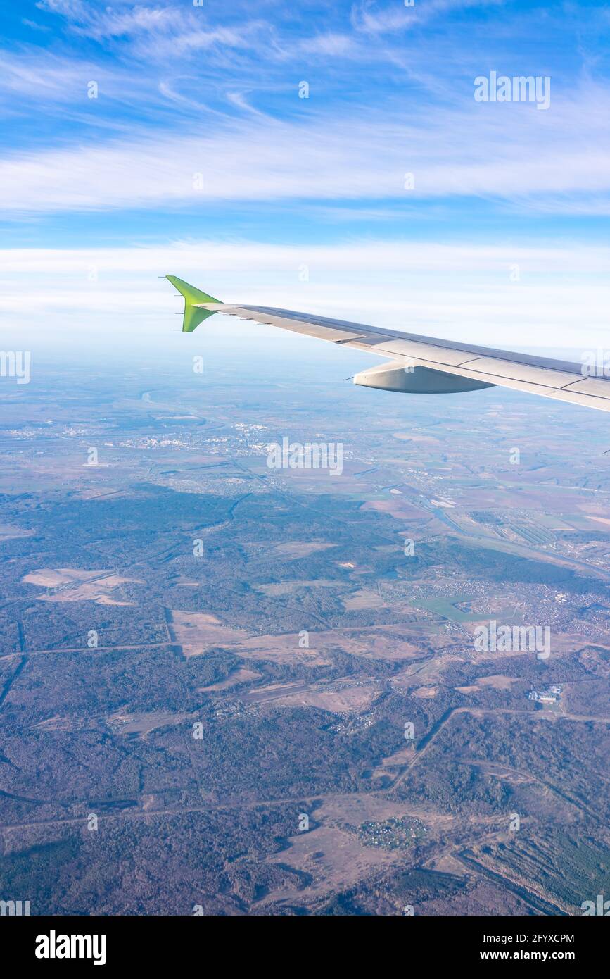 Earth and sky as seen through window of an airplane Stock Photo - Alamy