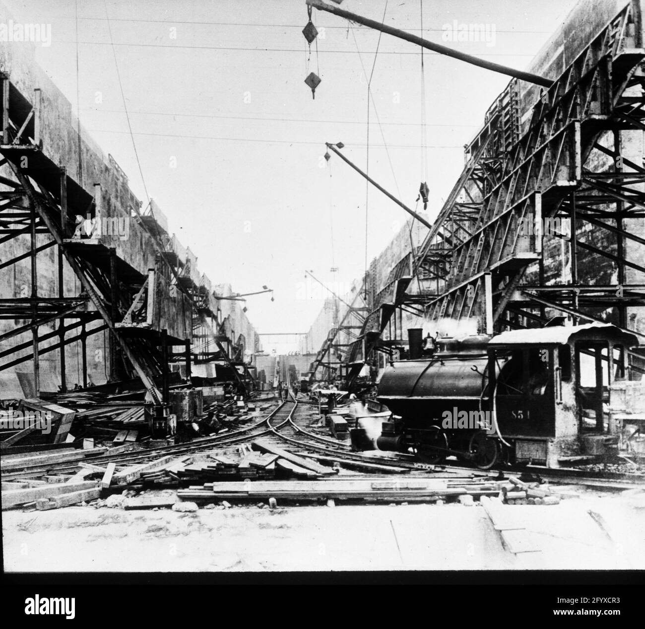 A steam train at work during the construction of the Panama Canal ...
