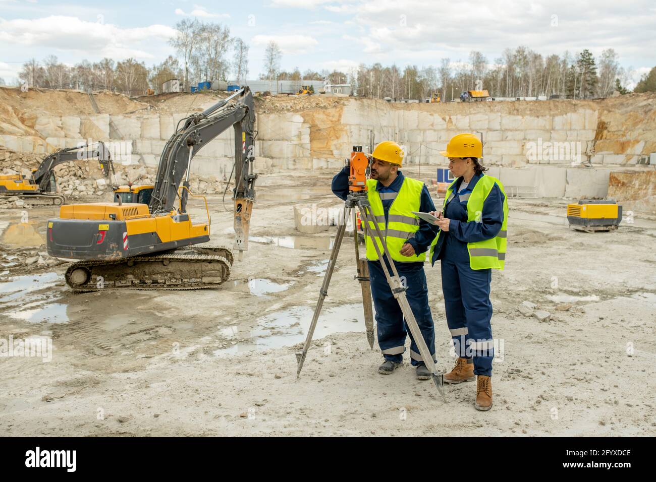 Male female surveyors in working hi-res stock photography and images ...