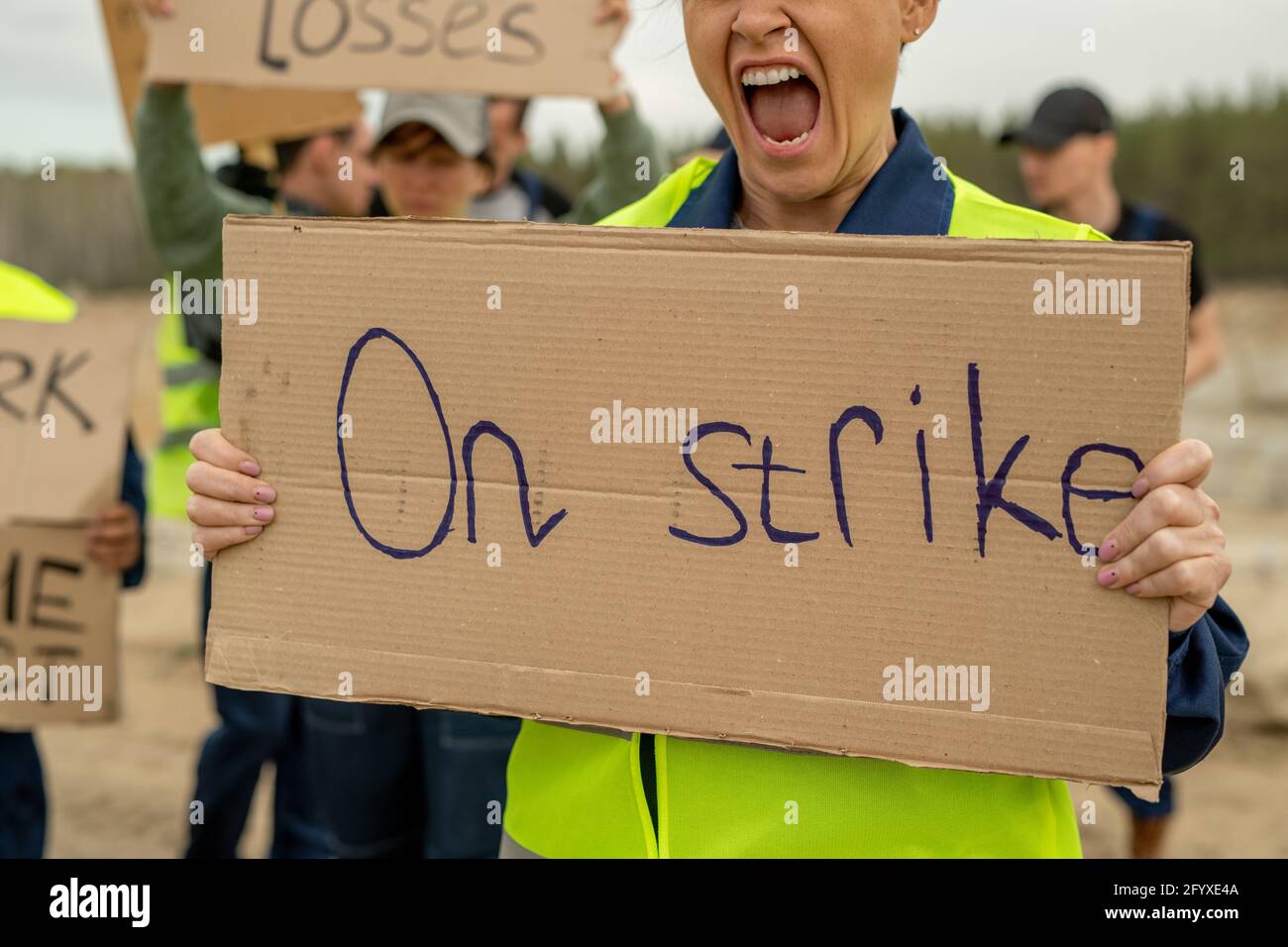 Cardboard begging sign hi-res stock photography and images - Alamy