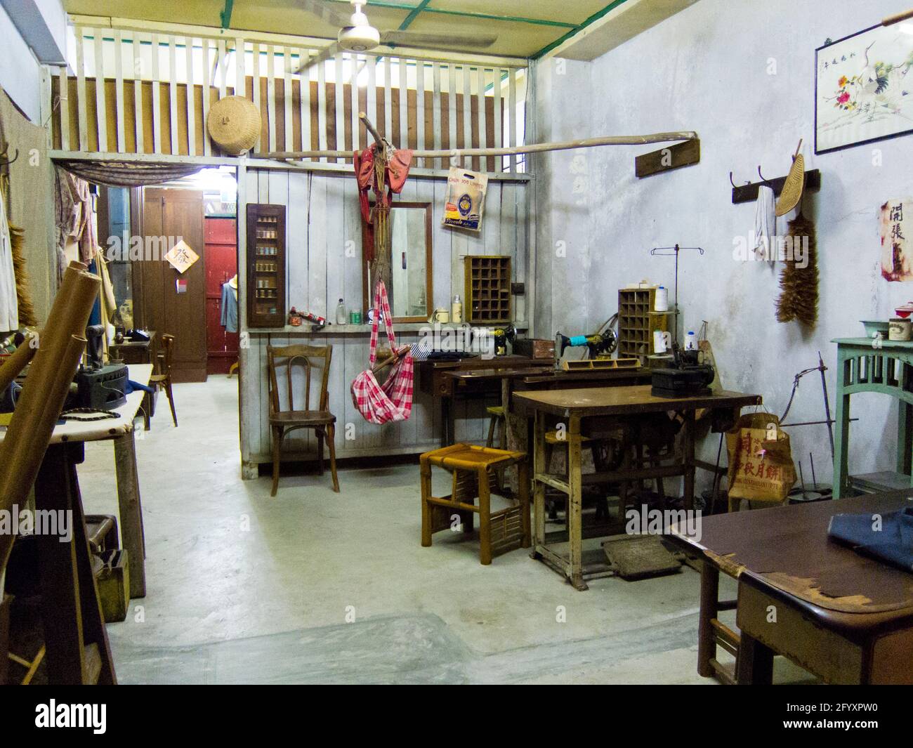 An old style tailor, alteration fabric workshop at the Chinatown ...