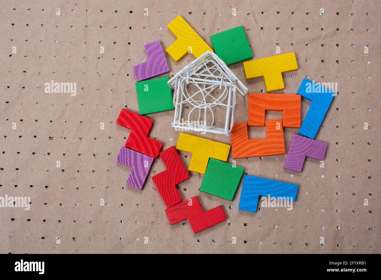 A top view of colorful creative wooden puzzle figures Stock Photo - Alamy