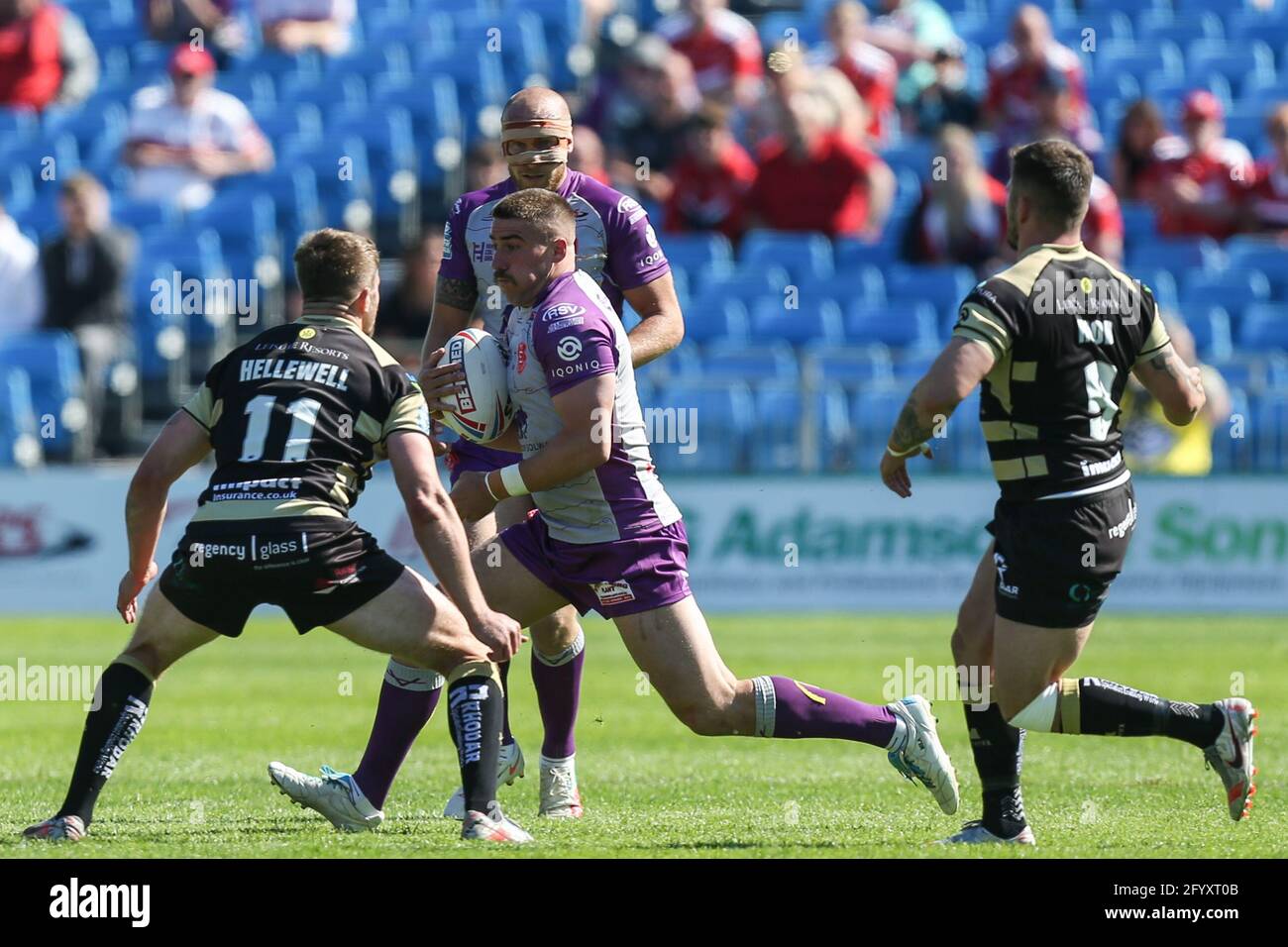 Greg Minikin (3) of Hull KR runs at Ben Hellewell (11) of Leigh ...