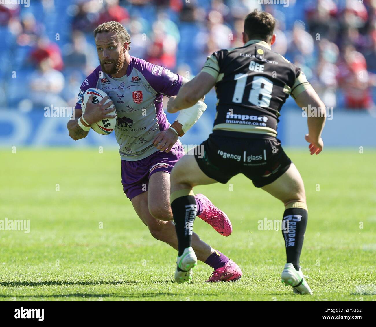 Korbin Sims (10) of Hull KR looks to go past Matty Gee (18) of Leigh ...