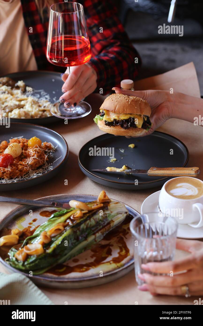 set lunch table with different dishes Stock Photo - Alamy