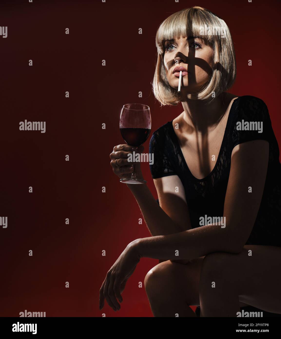 Blonde girl smoking hi-res stock photography and images - Alamy