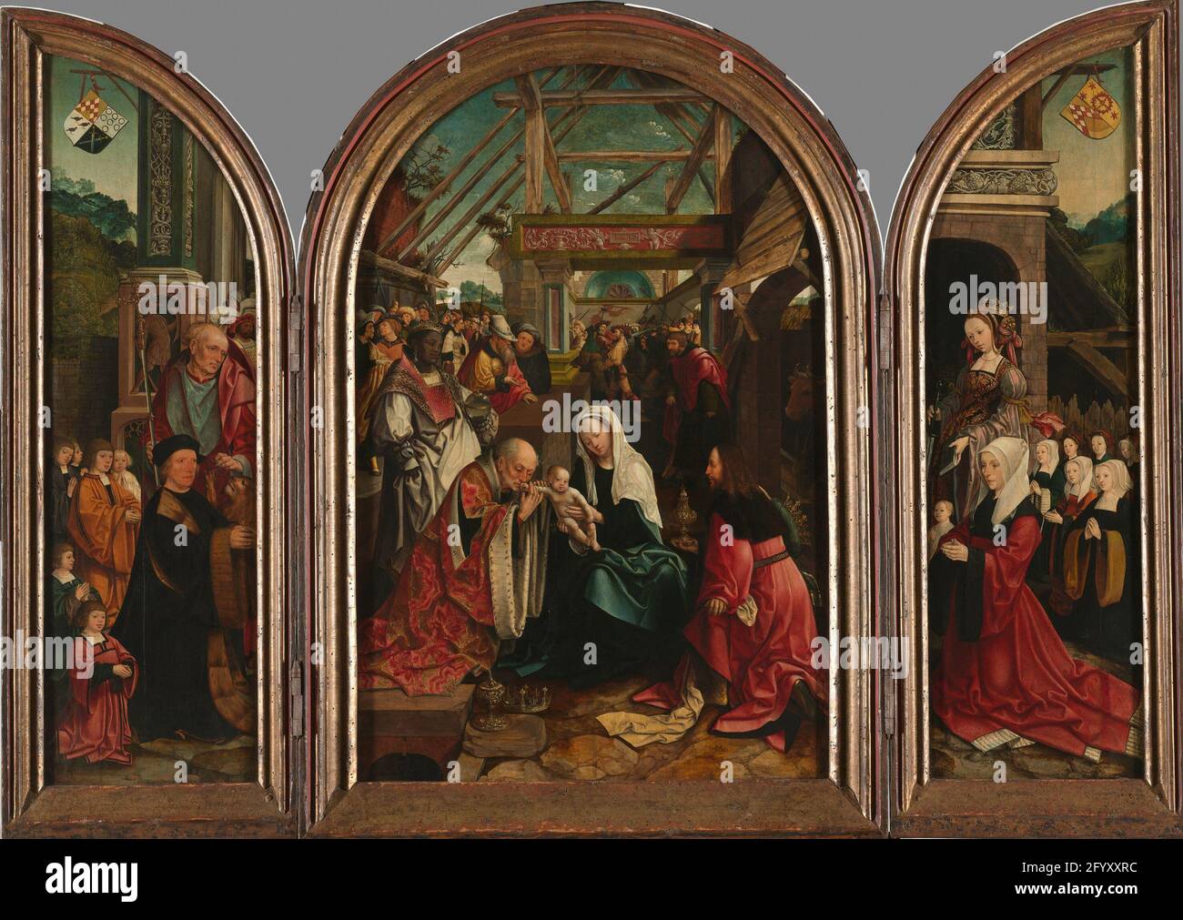 The Adoration of the Magi. The three kings worship the baby Jesus on the central panel. The ...