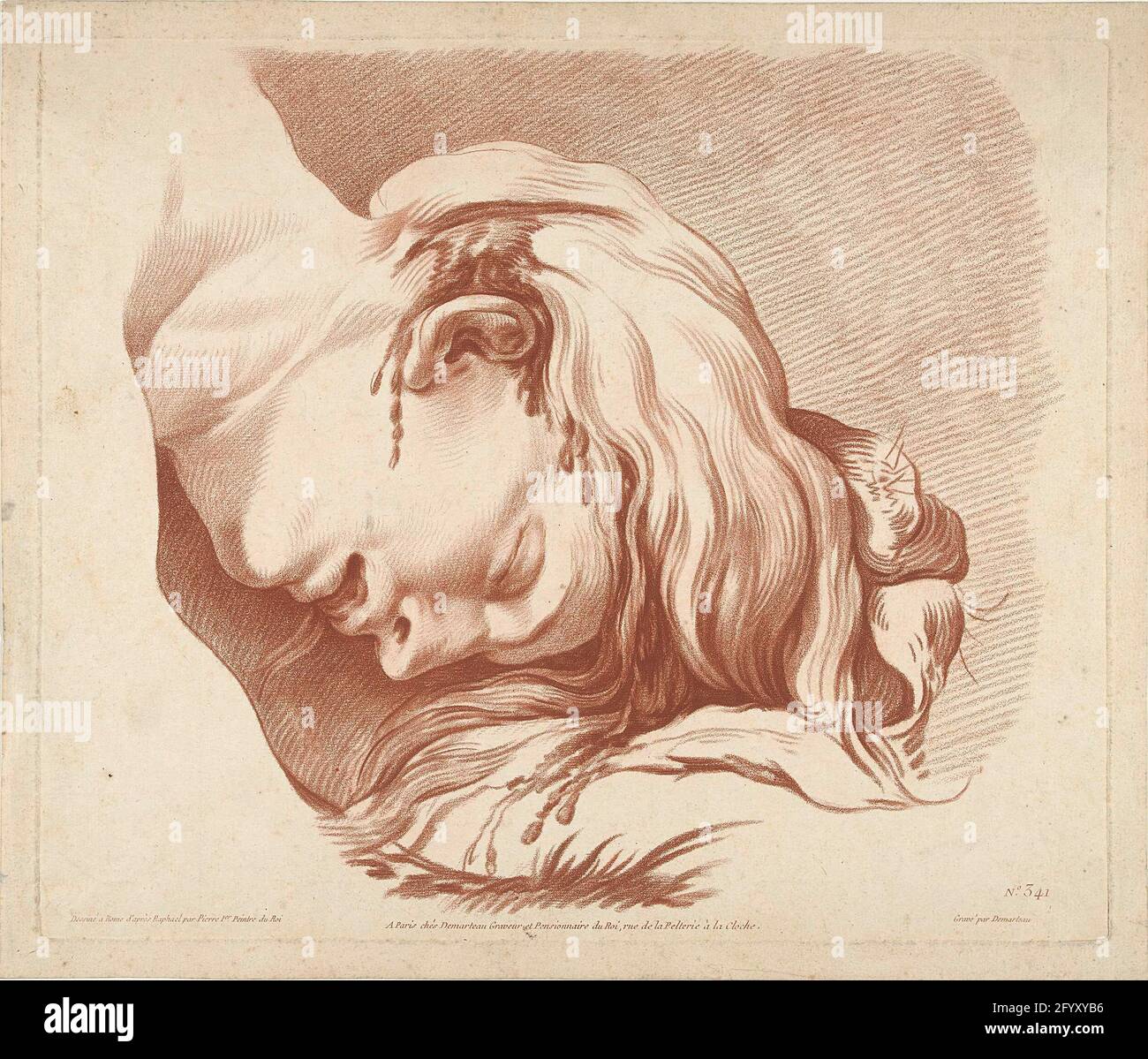 Head of figure lying on the ground with bleeding wound Stock Photo - Alamy