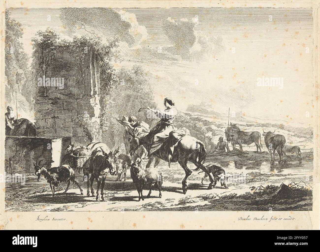 Shepherds with mules and cattle at source in mountain landscape ...