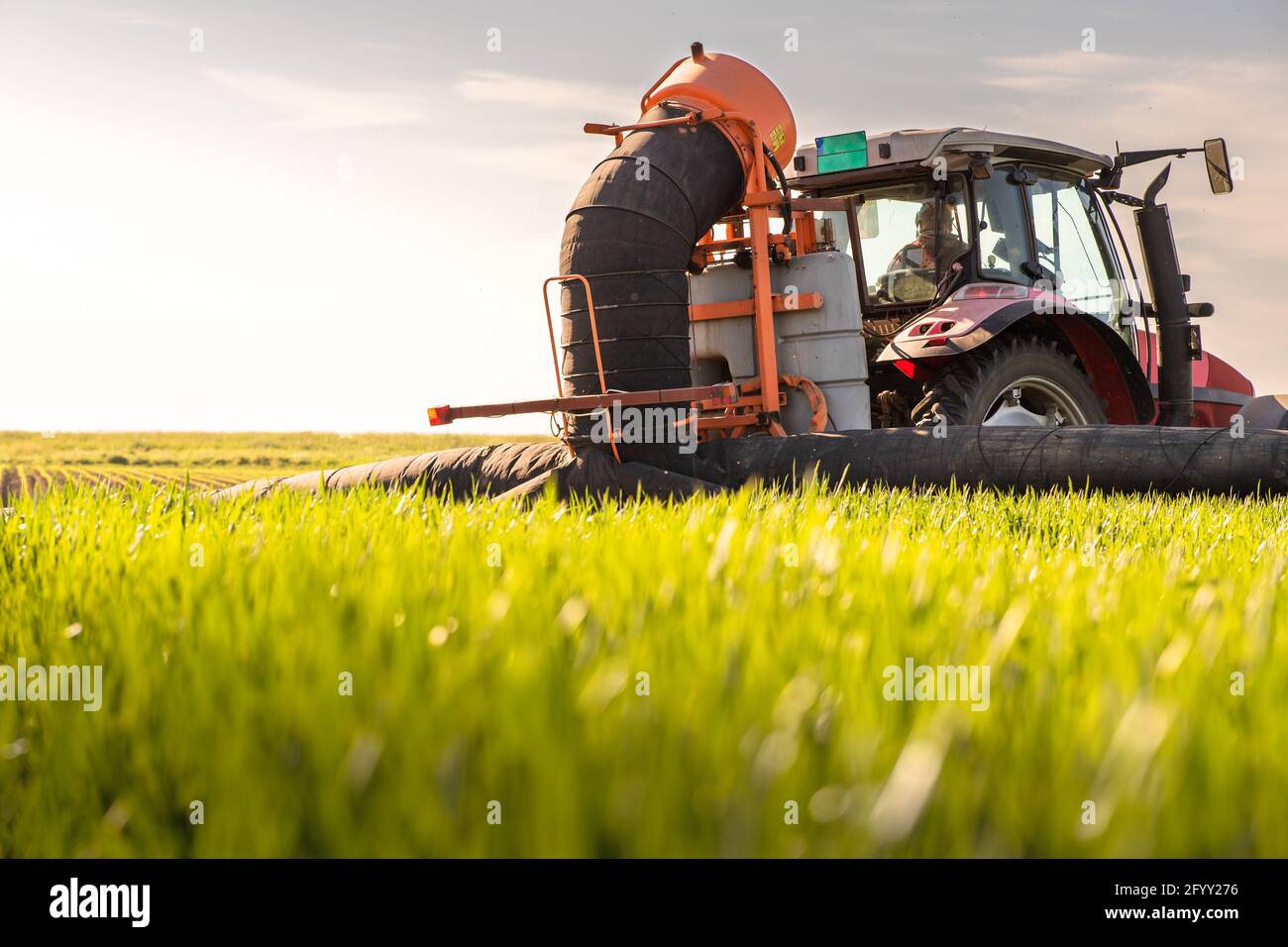 Spraying grass hi-res stock photography and images - Alamy