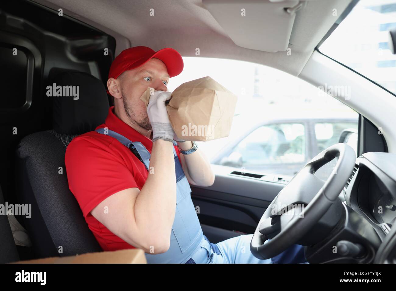 Man driver became ill while driving car Stock Photo - Alamy