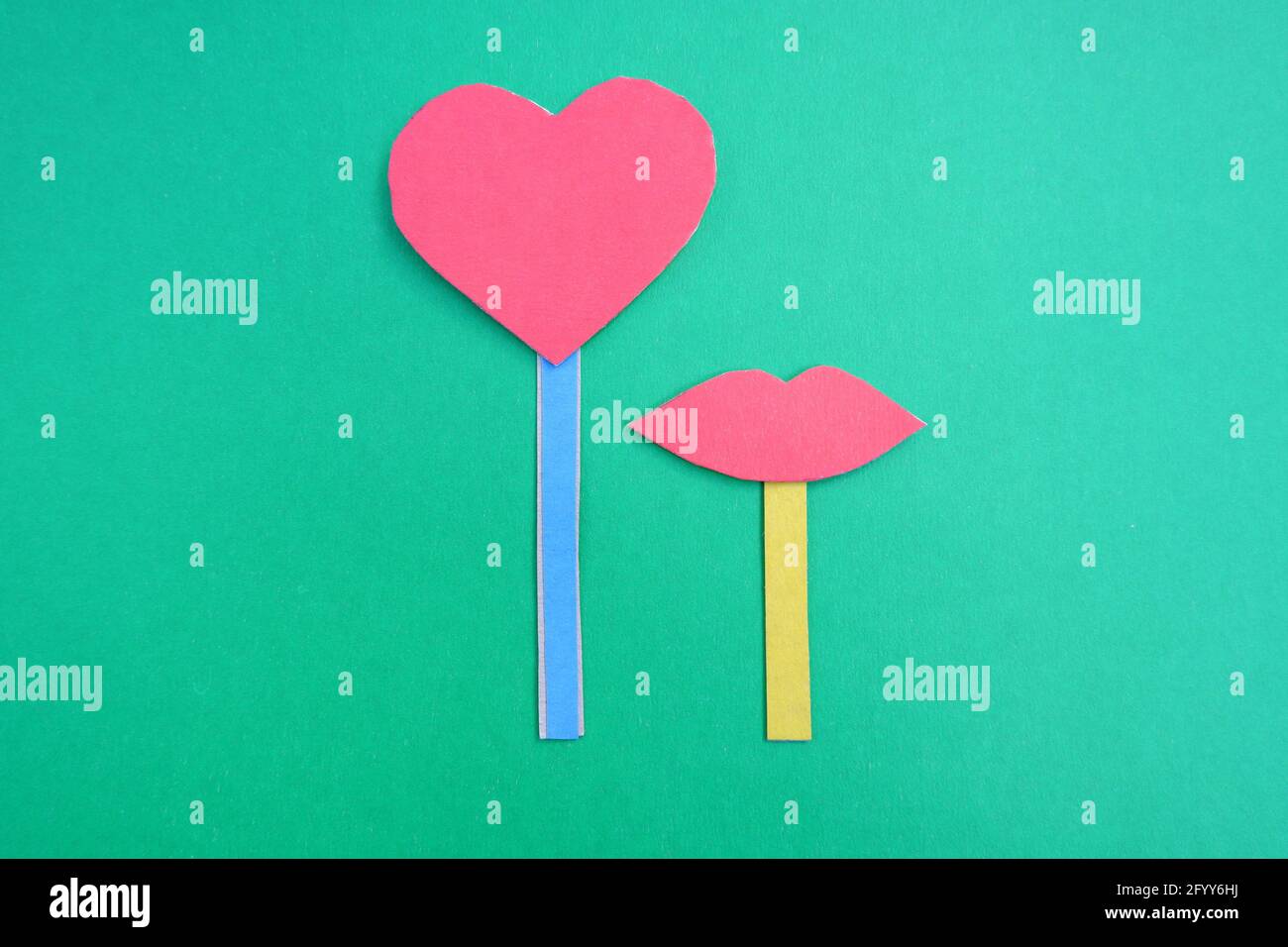 Paper hearts and lips on colored backgrounds. World Kiss Day Stock ...
