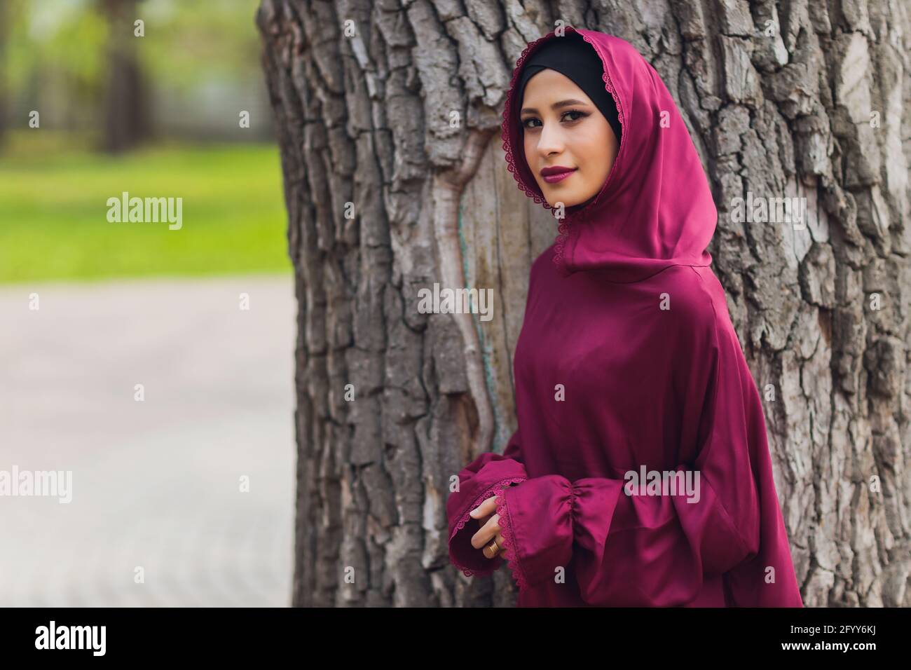 Confident Arab businessman smiling and walks of Dubai. Arab Business ...