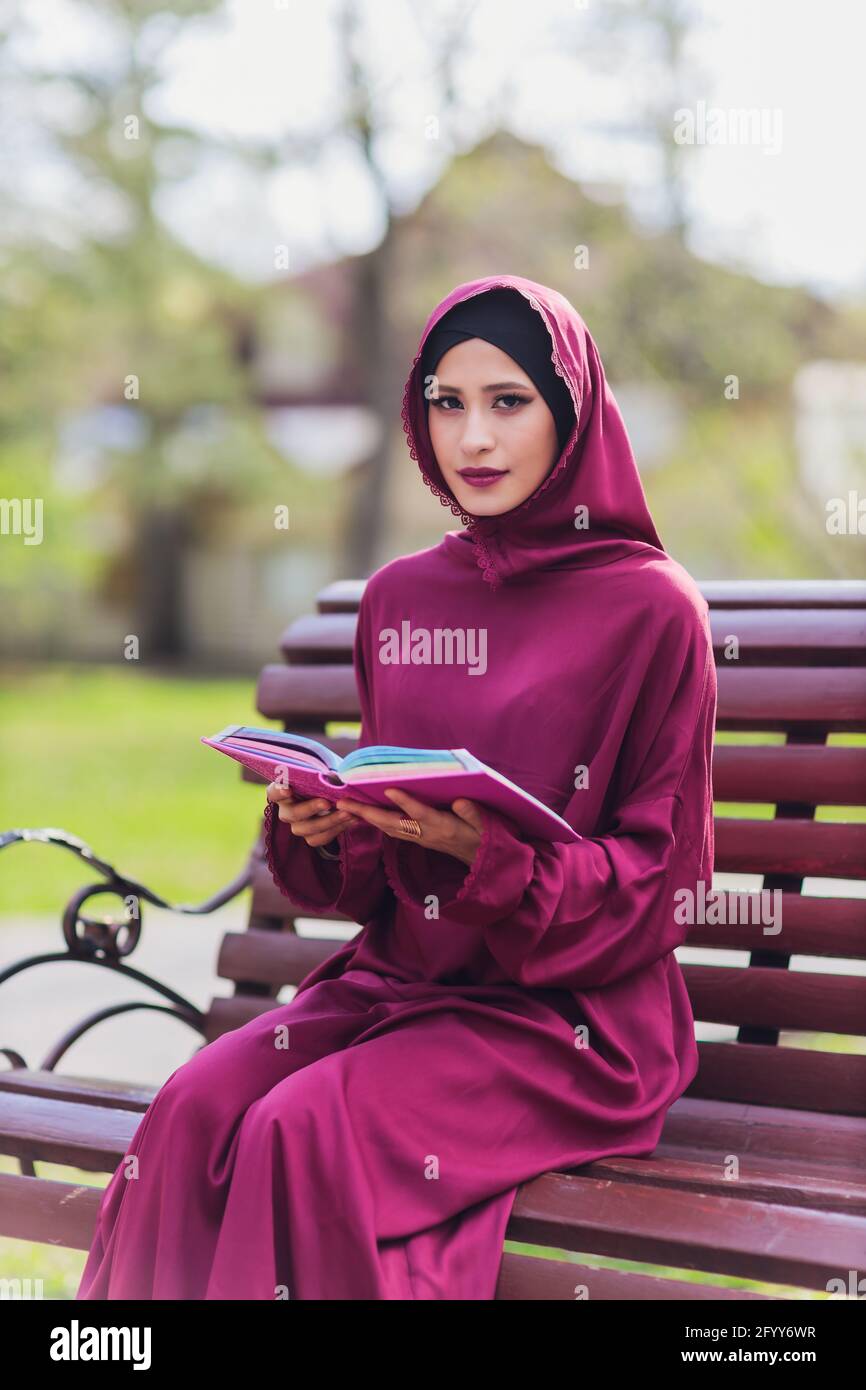 Confident Arab businessman smiling and walks of Dubai. Arab Business ...