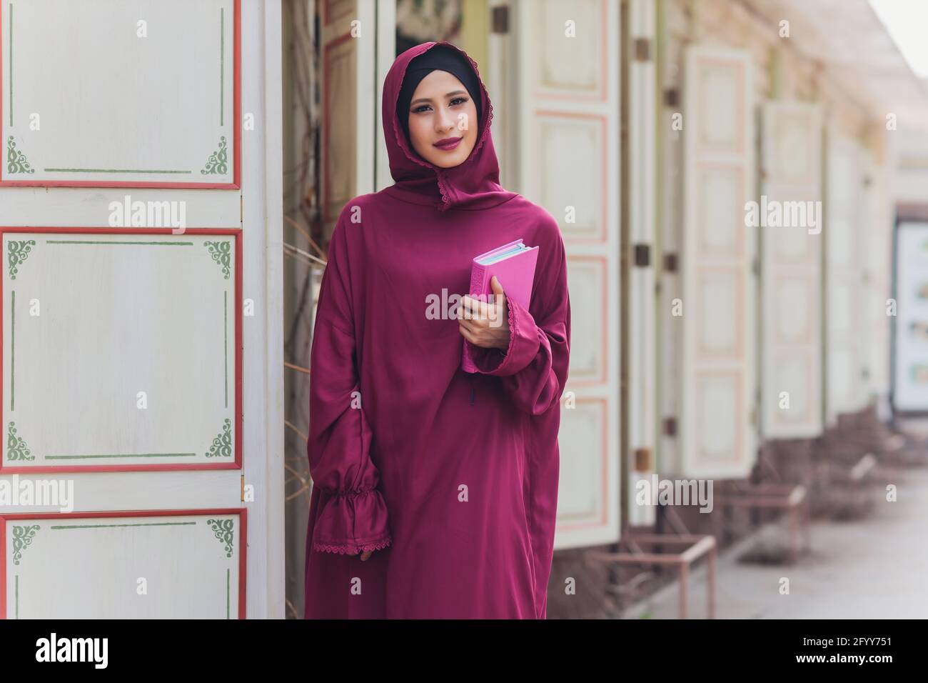 Confident Arab businessman smiling and walks of Dubai. Arab Business ...