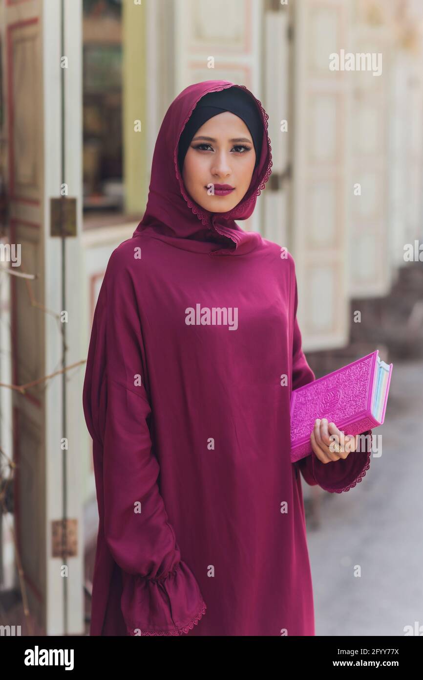 Confident Arab businessman smiling and walks of Dubai. Arab Business ...