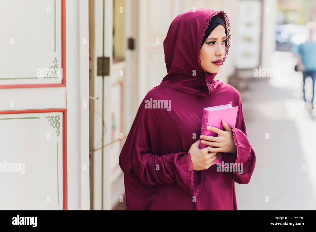Confident Arab businessman smiling and walks of Dubai. Arab Business ...