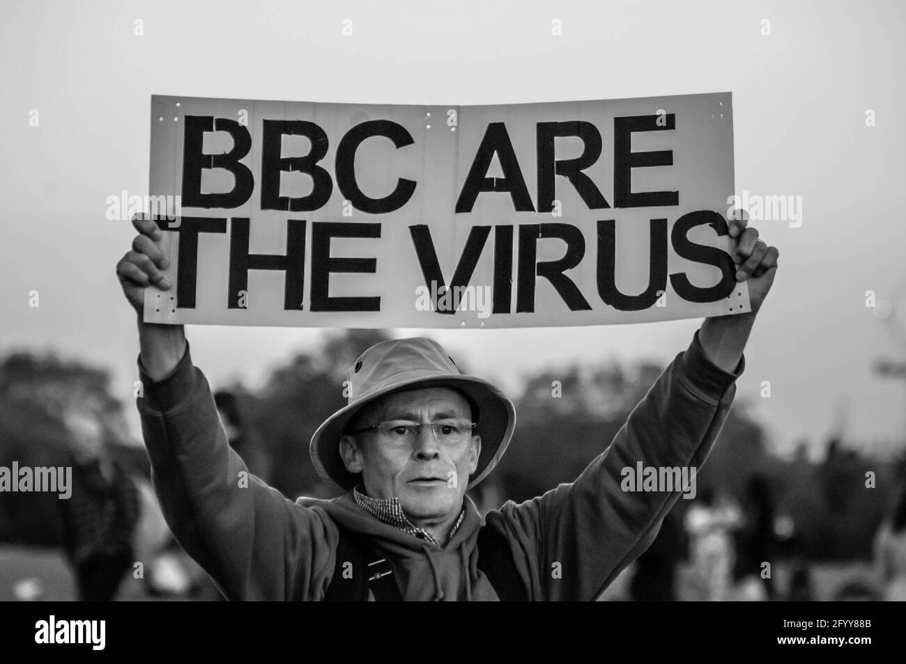 HYDE PARK, LONDON, ENGLAND- 29 May 2021: Protester holding a BBC ARE ...