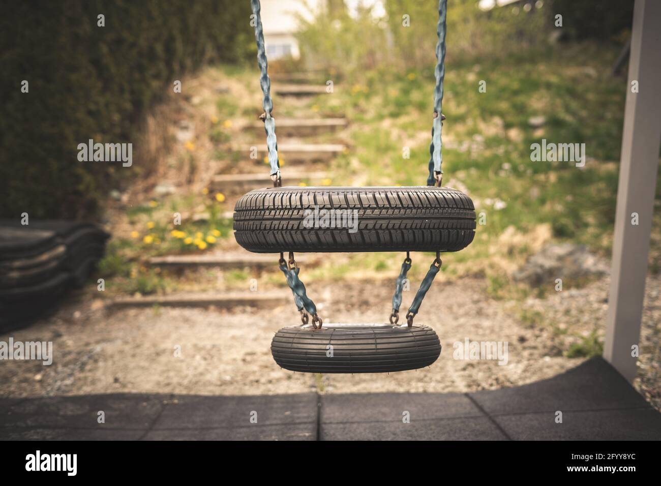 The closeup of tire swings Stock Photo - Alamy
