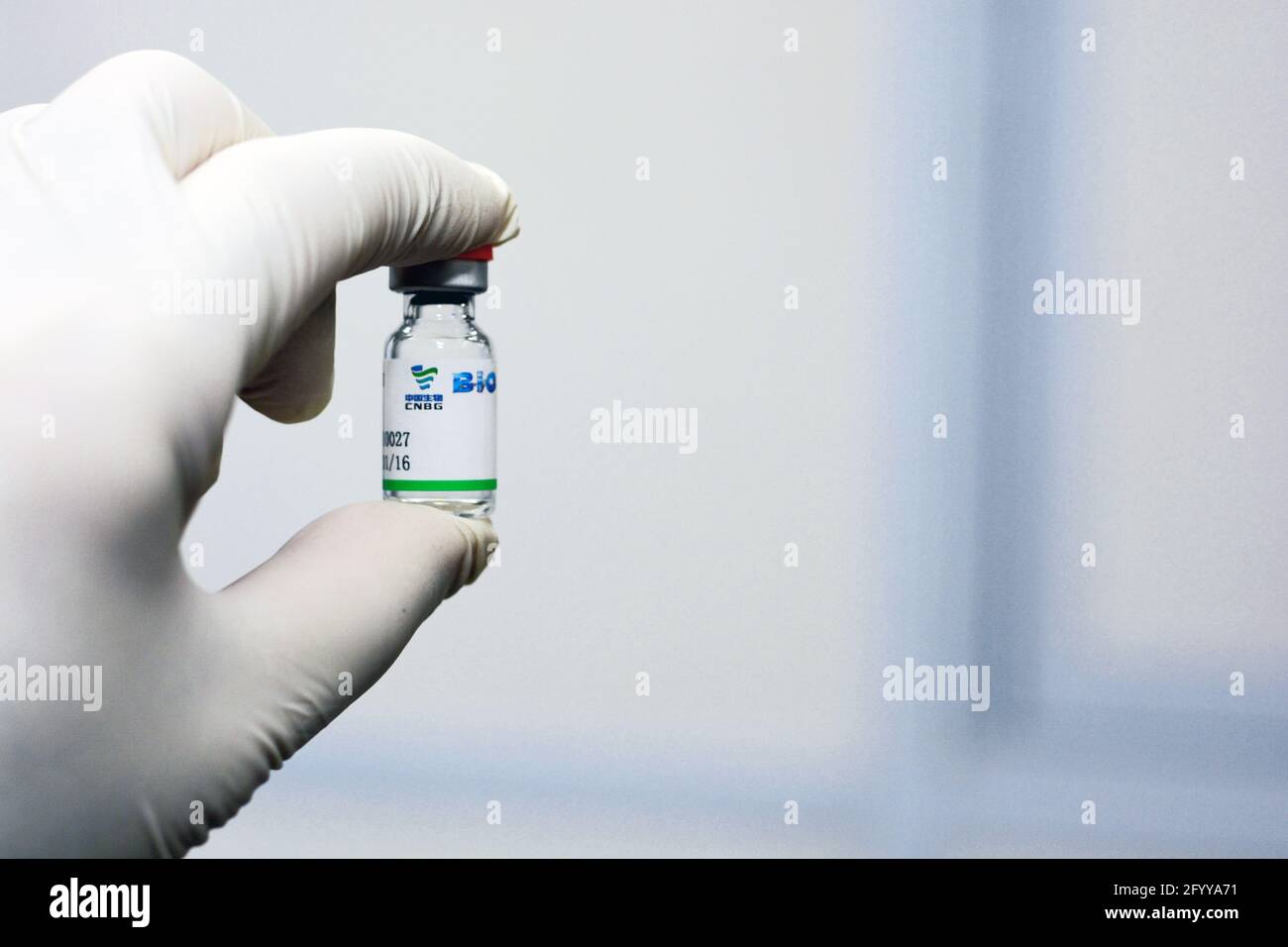 Sinopharm COVID-19 vaccine bottle dose loaded in a syringe, Sars-Cov-2 ...