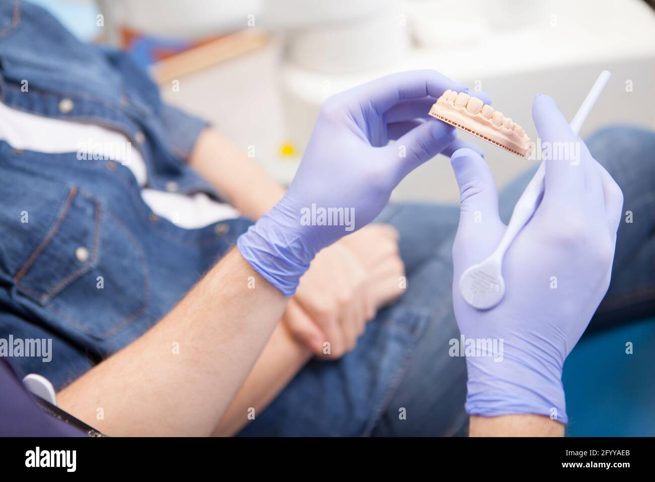 Dentist showing dentures close hi-res stock photography and images - Alamy