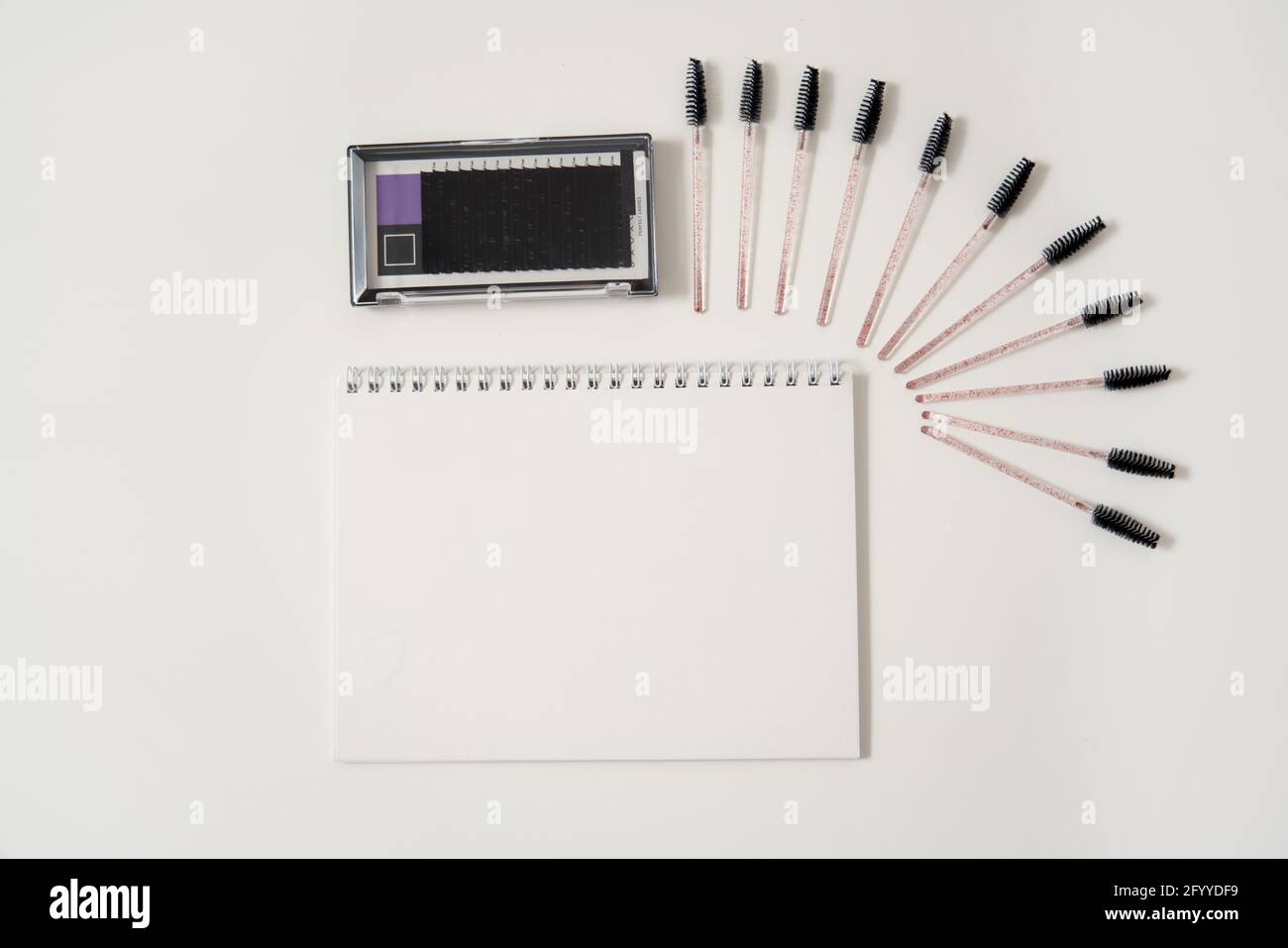 Set of eyelash instruments with notepad and copyspace Stock Photo - Alamy