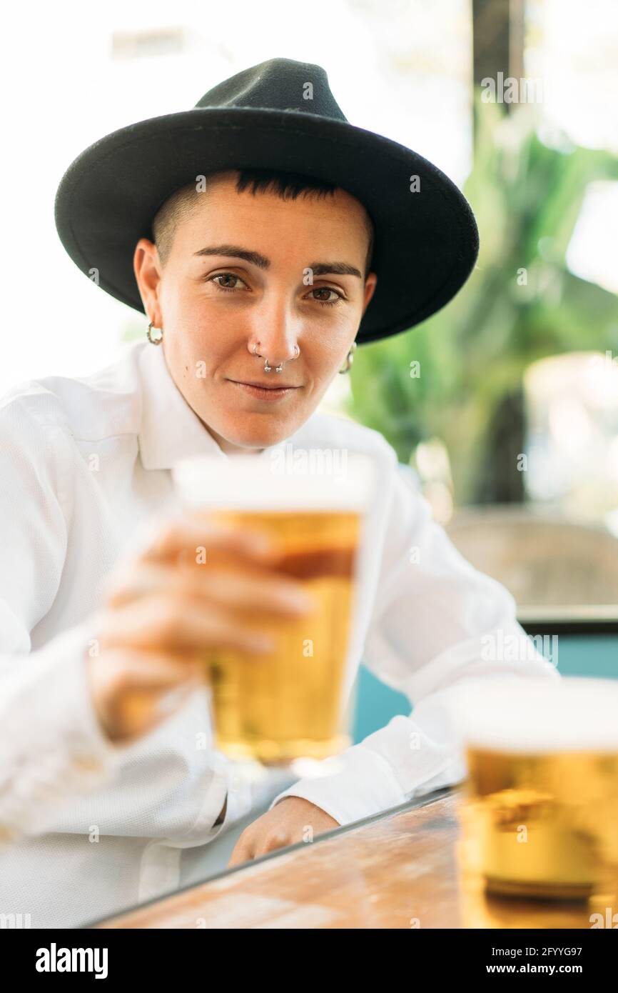 Woman drinking pint lager in hi-res stock photography and images - Alamy