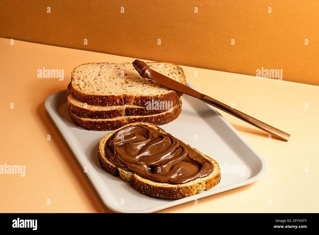 Chocolate cream sandwich on a tray on the table ready for breakfast ...