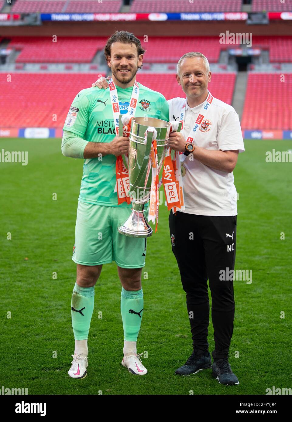 London, UK. 30th May, 2021. Blackpool goalkeeper Chris Maxwell and ...