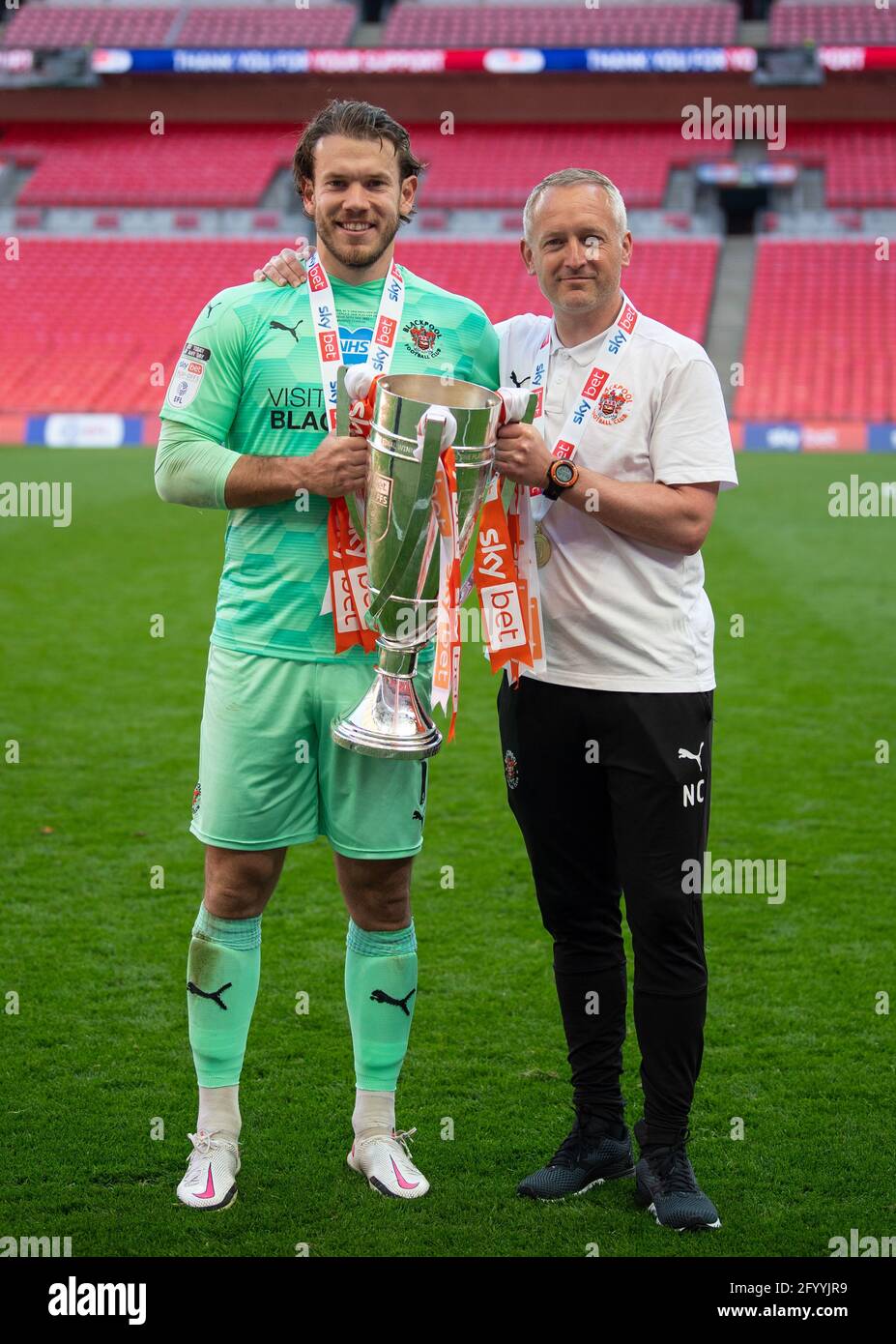 London, UK. 30th May, 2021. Blackpool manager Neil Critchley and ...
