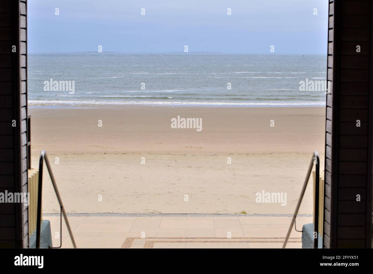 A beautiful shotof the sunny beach and the ocean from the inside Stock ...